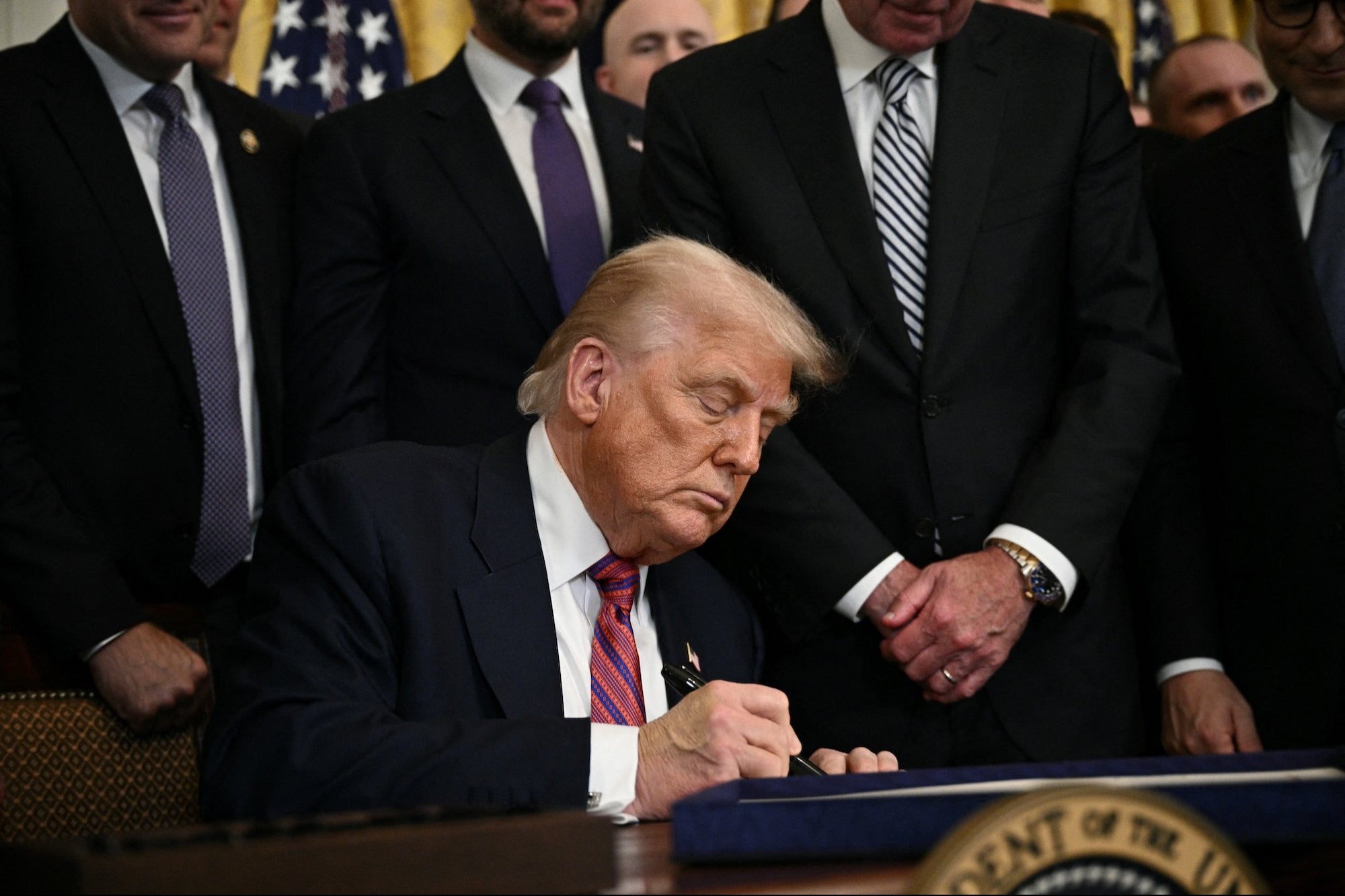 President Donald Trump Signs GENIUS Act: 'Crypto Capital'